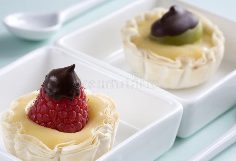 Two Pastries on Serving Plates Stock Photo - Image of cream, fresh: 3514894