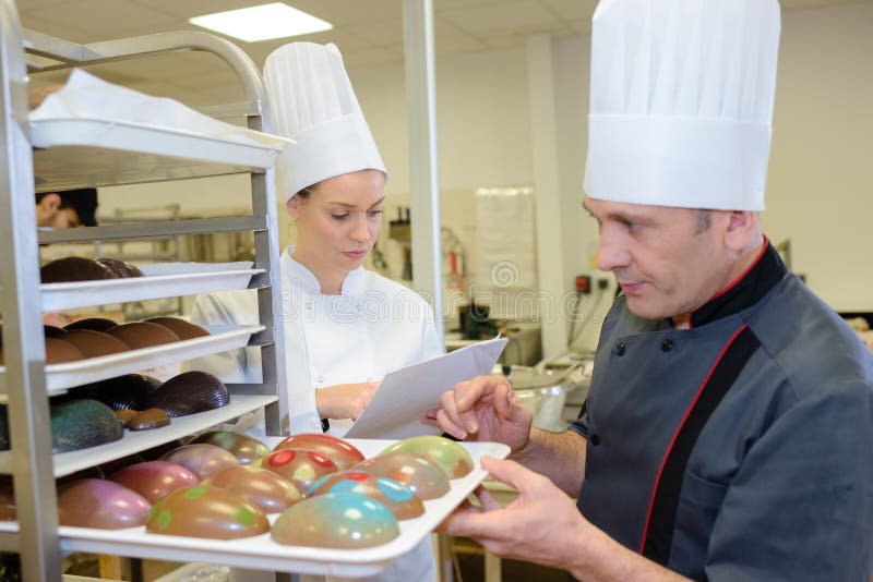 Pastry chefs in training stock image. Image of chef - 118890399