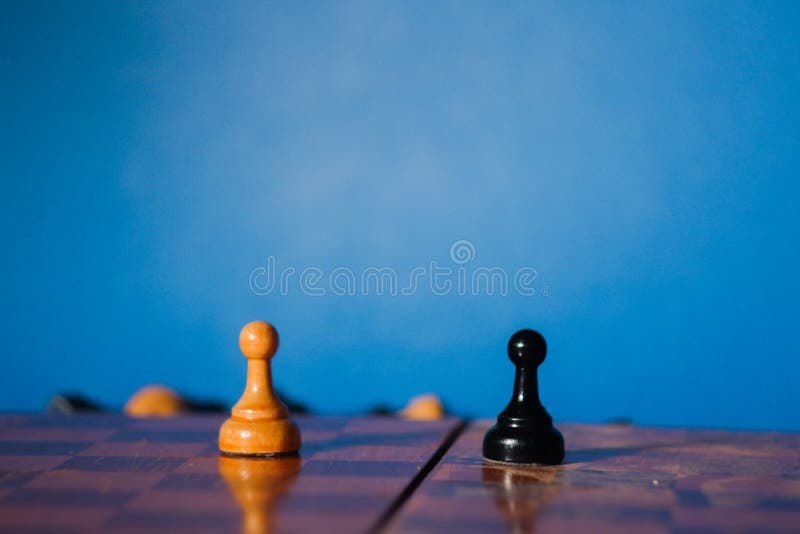 Two Pawn Stand in Front of Each Other Stock Photo - Image of ...