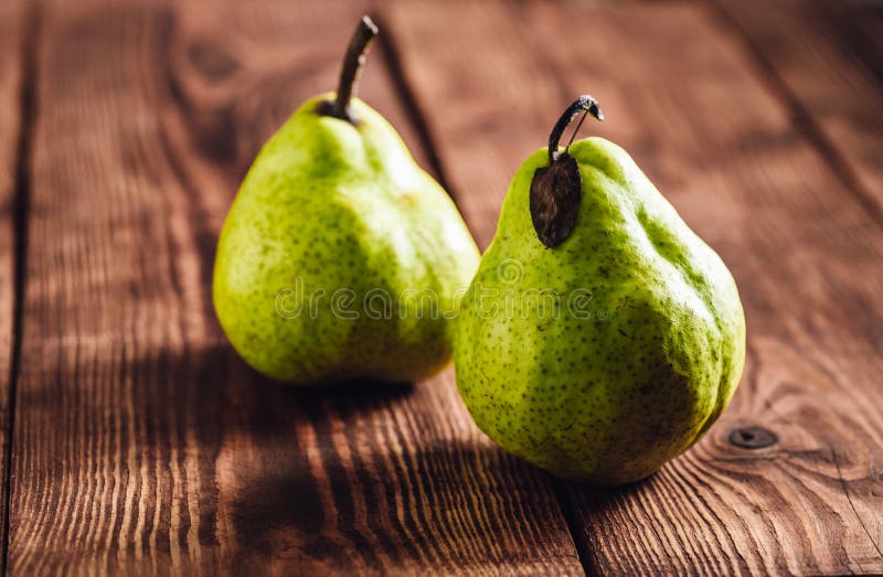 Two Pear on Wooden Background. Stock Photo - Image of minimal, autumn ...