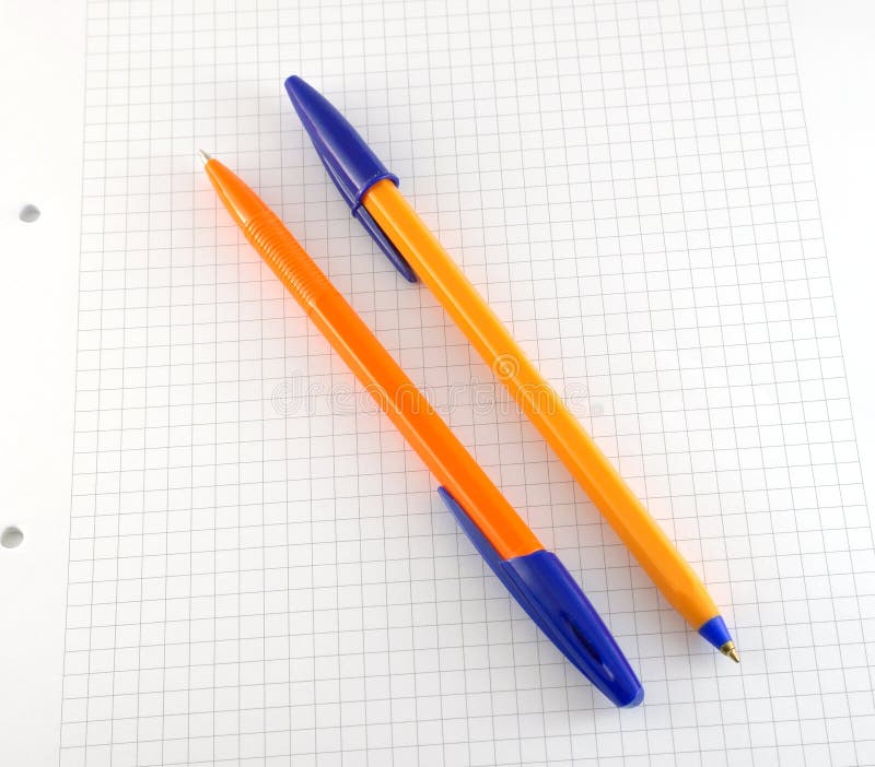 Two Pen on the Checked Paper Stock Photo - Image of back, paper: 39176280
