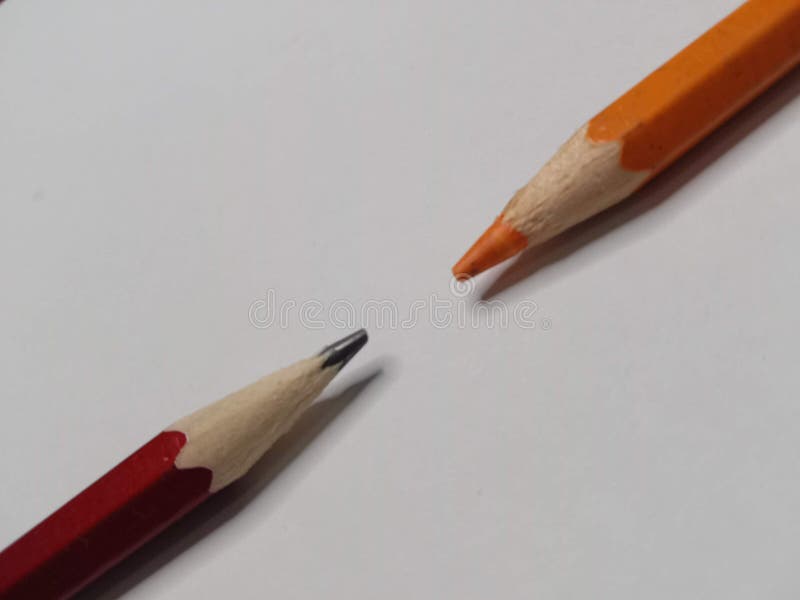 Two Pencil on White Paper stock photo. Image of finger - 240274670