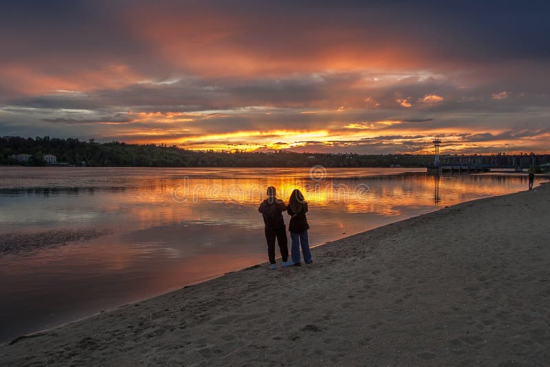 Two People on the Bank of the River Stock Photo - Image of people ...