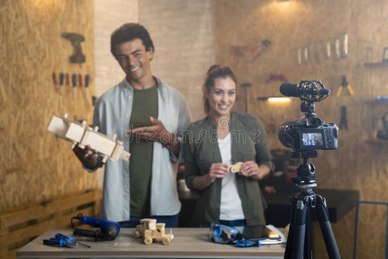 Two People in a Carpentry Workshop Being Filmed with a Camera for a ...