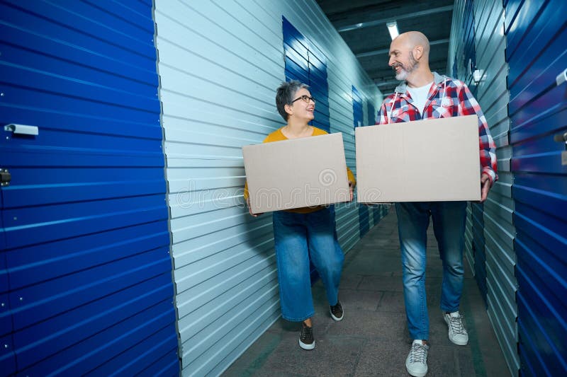 Two People Carry Cardboard Boxes with Things Stock Photo - Image of ...