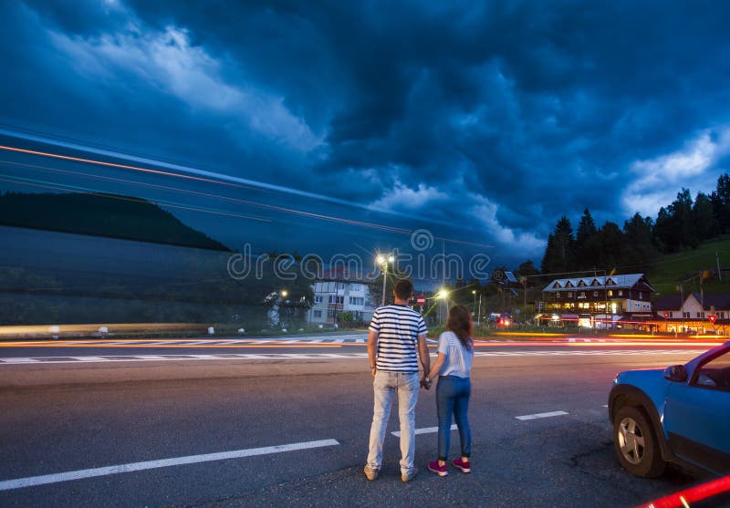 Two People. Couple Holding Hands in the Storm Clouds Stock Image ...