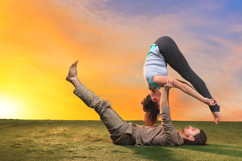 The Two People Doing Yoga Exercises Stock Photo - Image of health ...