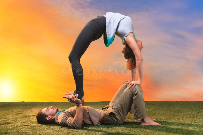 The Two People Doing Yoga Exercises Stock Photo - Image of ...