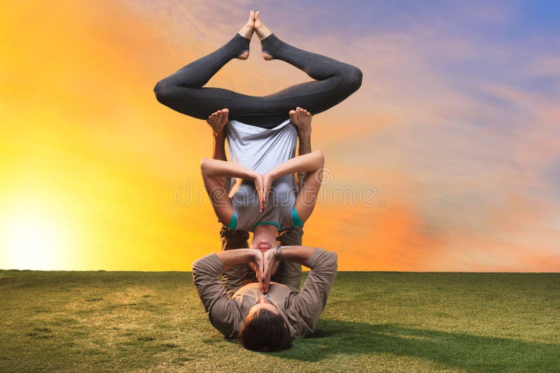 The Two People Doing Yoga Exercises Stock Photo - Image of people ...
