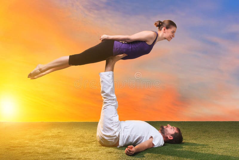 The Two People Doing Yoga Exercises Stock Image - Image of lotus, asana ...