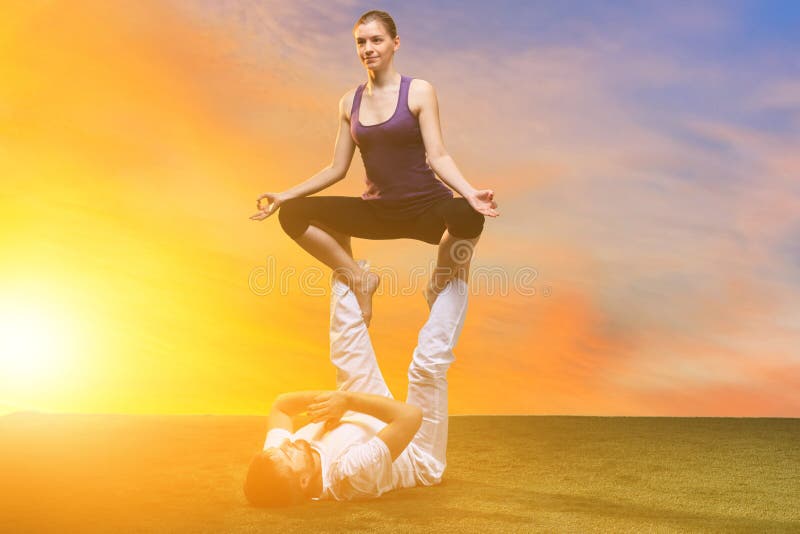 The Two People Doing Yoga Exercises Stock Photo - Image of group, body ...