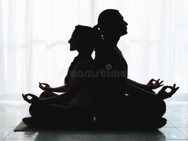 Two People are Doing Yoga Inside, they are in Shadows Stock Photo ...