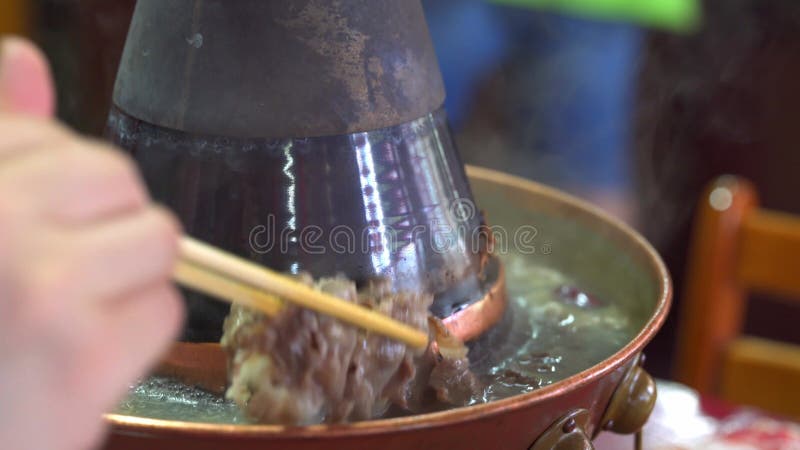 Two People are Eating Old Beijing Hot Pot Mutton, Copper Pot Shabu ...