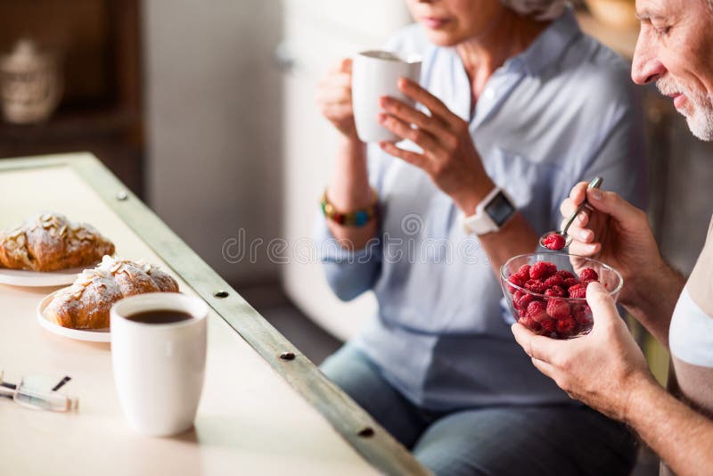 Two People Eating Raspberry at the Kitchen Stock Image - Image of light ...