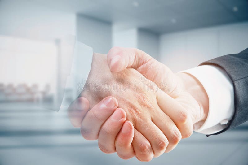 Two People Engaging in a Handshake, Symbolizing Agreement, with a ...