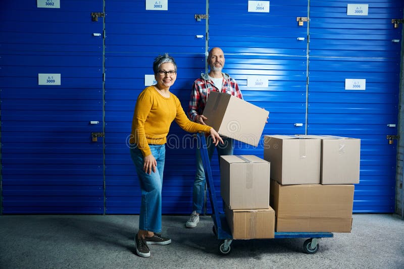 Two People in Front of the Storage Room Entrance Stock Photo - Image of ...