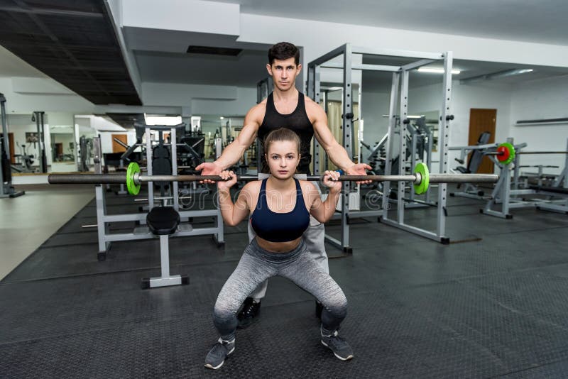 Two People in Gym Making Exercise Together Stock Photo - Image of ...