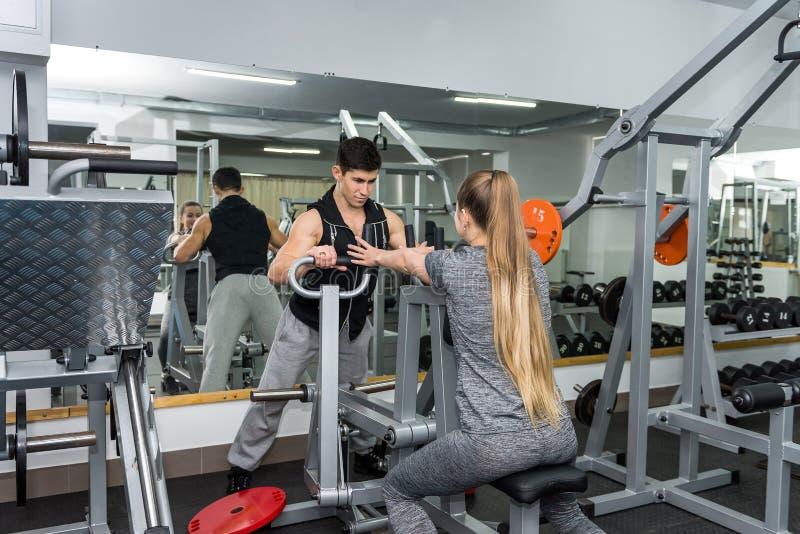 Two People in Gym Making Exercise Together Stock Photo - Image of ...