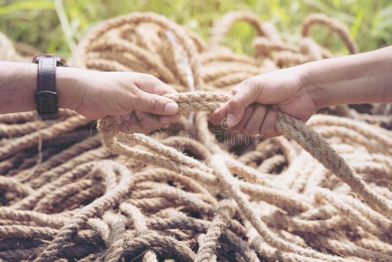 165 Two Hands Pulling Rope Photos - Free & Royalty-Free Stock Photos ...
