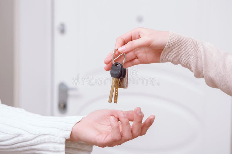 Two people holding keys stock photo. Image of leisure - 53352722