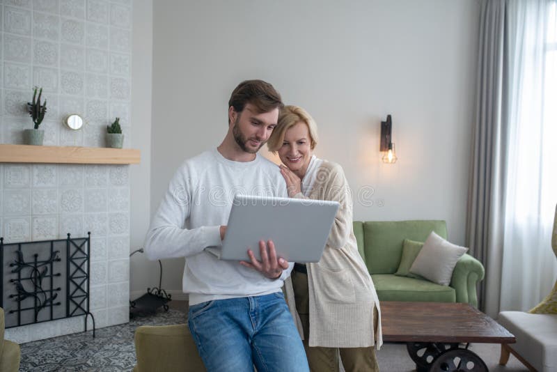 Two People at Home with a Laptop Stock Image - Image of peace, interior ...