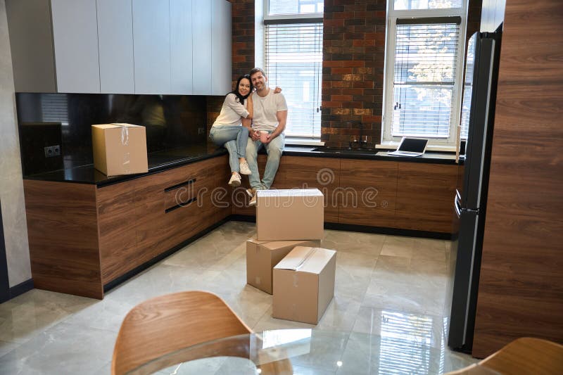 Two People Hugging Smiling and Looking at the Camera Stock Image ...