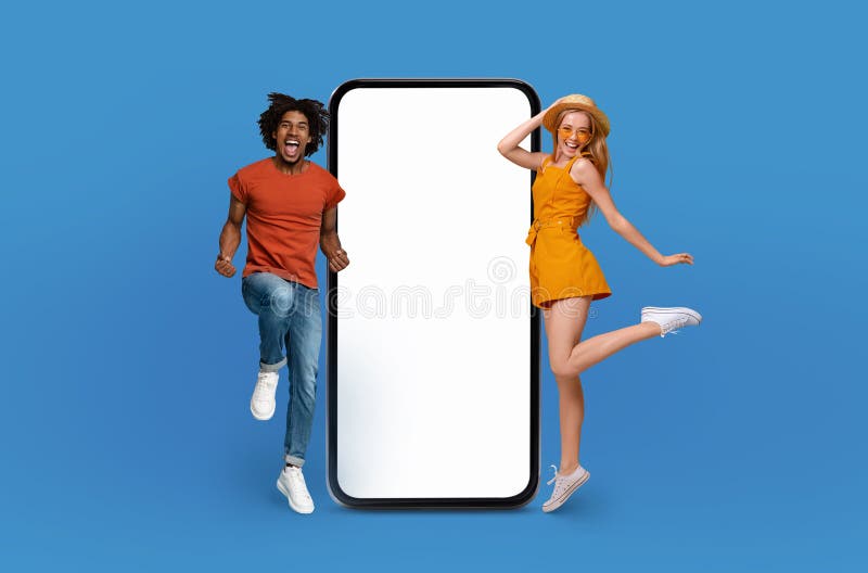 Two People Jumping in Front of Blank Screen, Mockup Stock Image - Image ...