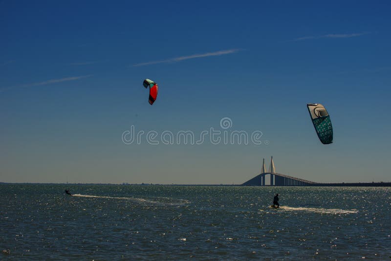 Two People Kiting Water Bridge Stock Photos - Free & Royalty-Free Stock ...