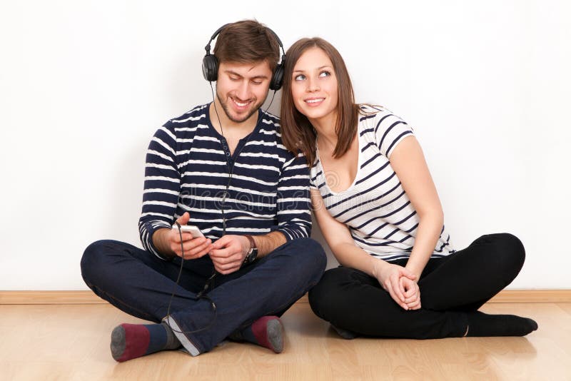 Two People Listening To Music Stock Photo - Image of lifestyle, family ...