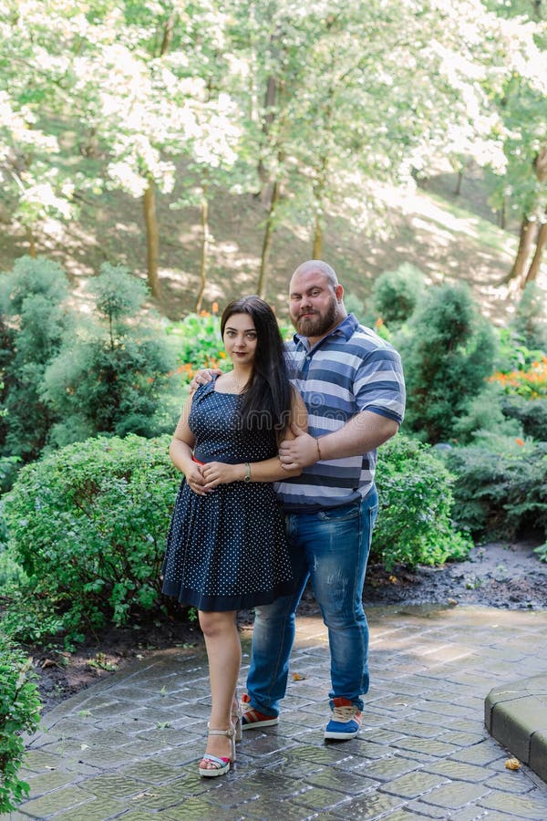 Two People in Love are Standing on a Beautiful Alley in the Park. Stock ...