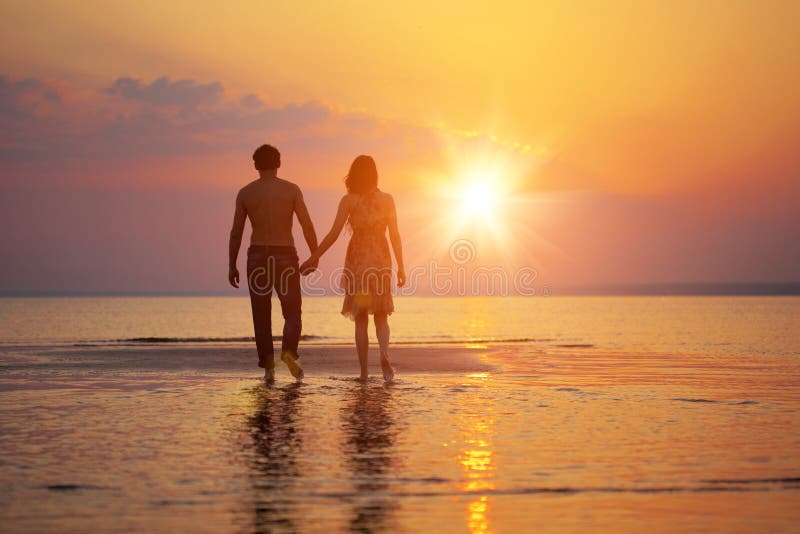 Two People In Love On The Beach