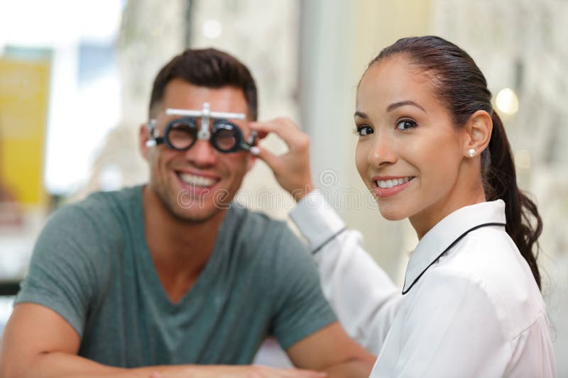 Two People in Optical Store Stock Image - Image of oculist, background ...