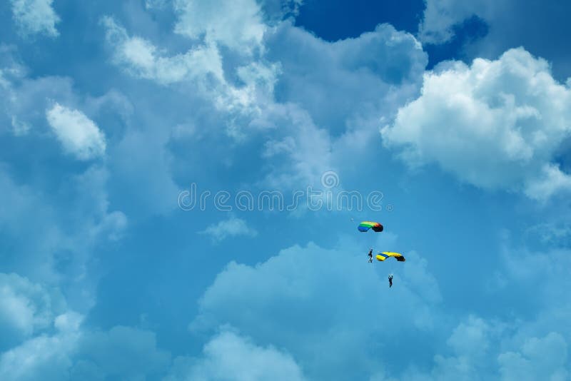 People parachuting and sky stock photo. Image of colors - 119688630