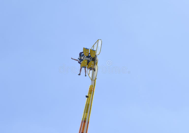 Two People in a Park on a Catapult Stock Image - Image of height ...