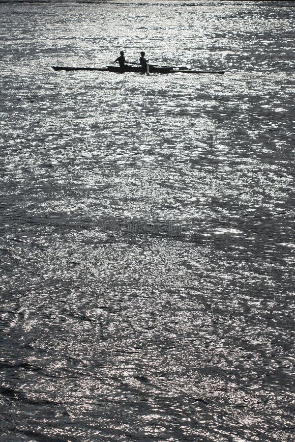 Two people rowing stock photo. Image of teamwork, team - 28813414