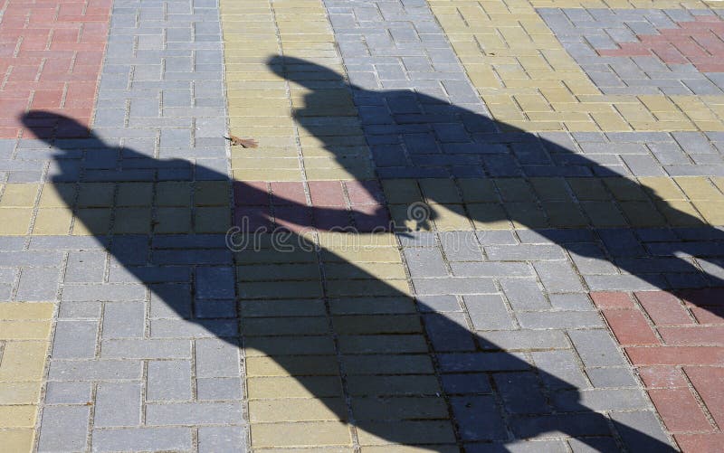 Two people shadow stock image. Image of evening, lover - 115670323