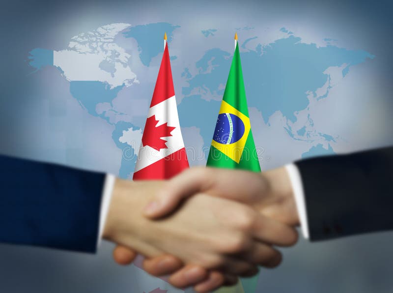 Two People Shaking Hands in Front of Canada and Brazil Flags Stock ...