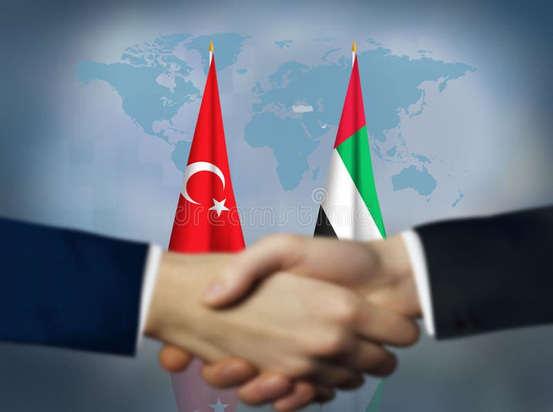 Two People Shaking Hands in Front of UAE and Turkey Flags Stock ...