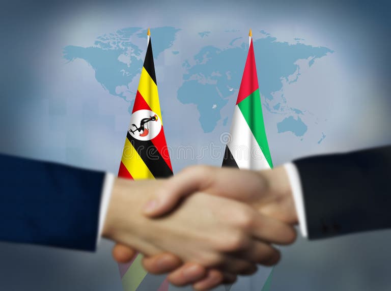 Two People Shaking Hands in Front of UAE and Uganda Flags Stock ...