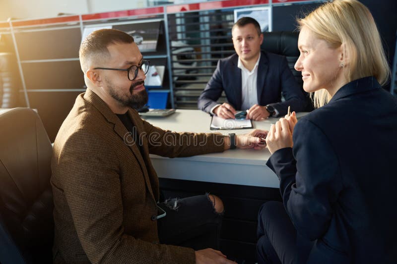 Two People Sitting Looking at Each Other Stock Photo - Image of agency ...