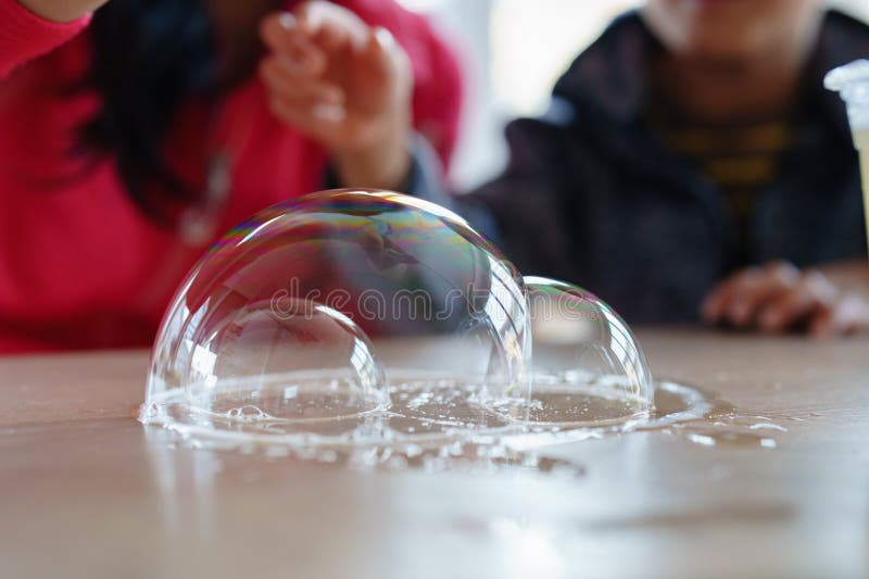 Multiple Bubbles on a Table Stock Image - Image of concentration ...
