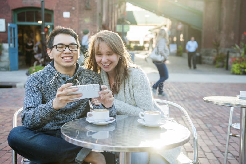 Two People with Smartphone in Cafe Stock Image - Image of cups ...