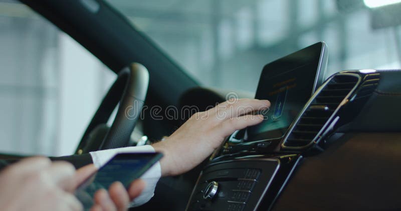 Two People Testing on-board Computer in Car Stock Photo - Image of ...