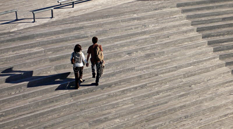 Two people walking stock image. Image of figure, architecture - 1414049