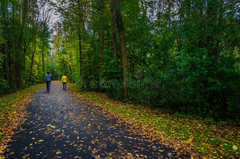 Two People Walking Down Path Winding Stock Photos - Free & Royalty-Free ...
