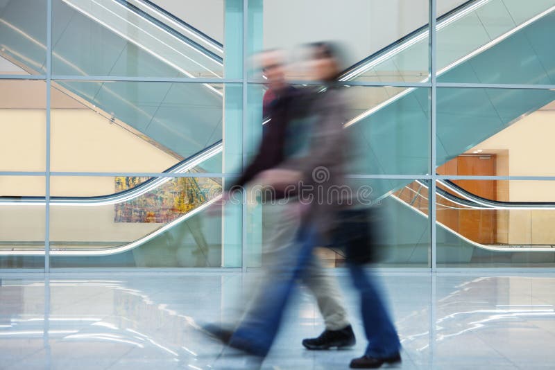People Rushing through Corridor, Motion Blur Stock Image - Image of ...