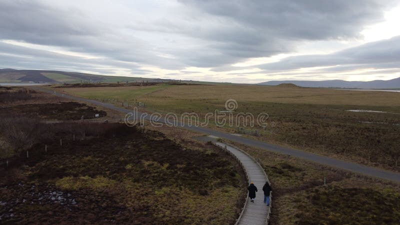 Two People Walking on a Winding Path Stock Image - Image of horizon ...