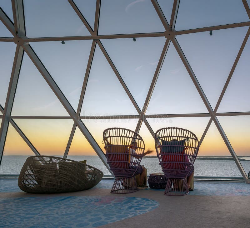 Two People Watch a Bahamian Sunrise Stock Image - Image of window ...