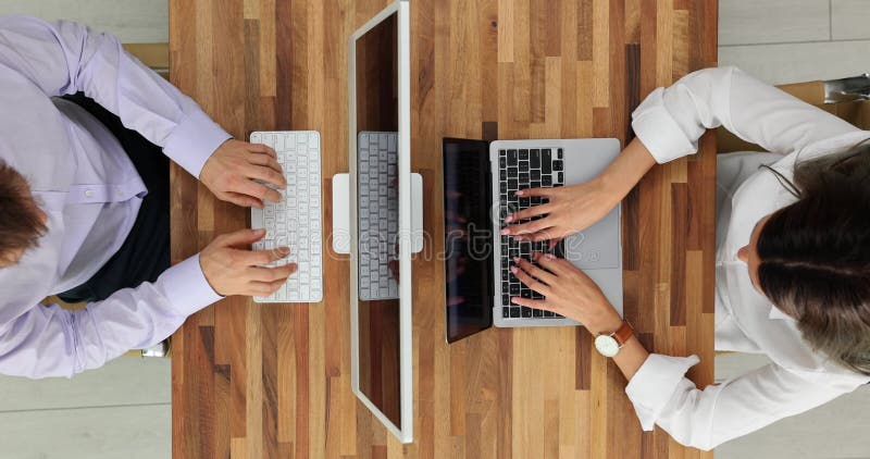 Two People Work at Computers in the Office Top View Stock Video - Video ...