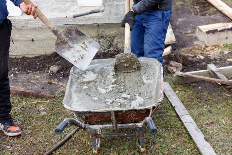 Two People are Working on a Construction Site Stock Image - Image of ...